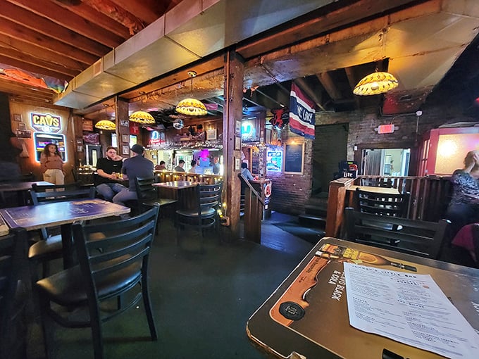 A dining room where strangers become friends and everyone feels like a regular. Those wooden chairs have supported countless happy meals.