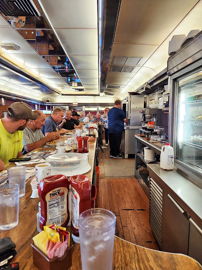 The counter seating offers front-row tickets to the culinary show. Where strangers become temporary neighbors united by good food.