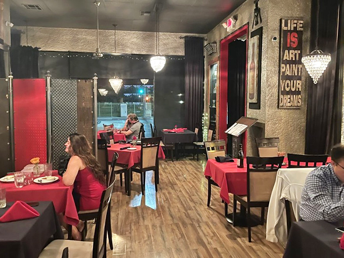 Even on a Tuesday night, diners lean in over red tablecloths, plotting their next bite like it's a delicious conspiracy.