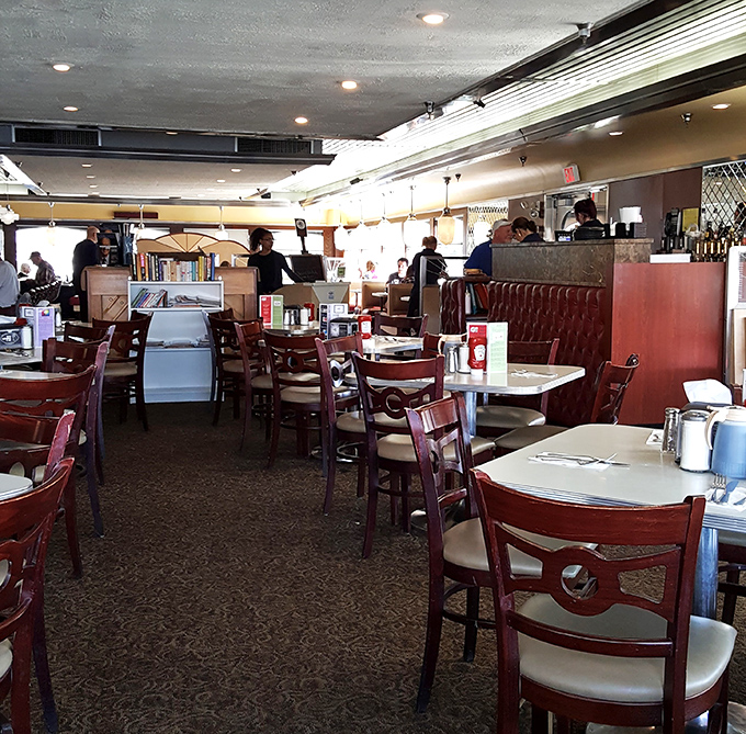 The dining area's warm wood tones and comfortable seating invite you to linger over that second (or third) cup of coffee&mdash;no judgment here.