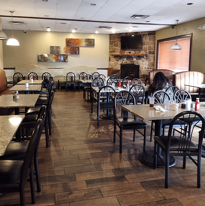 A dining room that whispers "stay awhile" with its stone fireplace and comfortable seating &ndash; the stage for countless family memories.