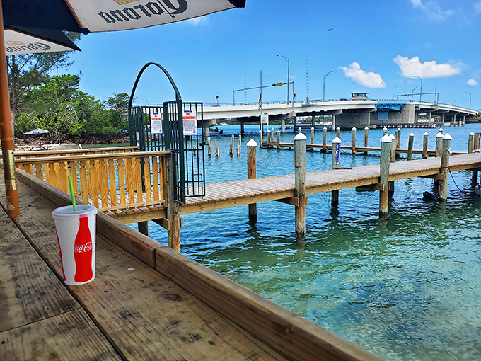 A simple Coca-Cola never had it so good &ndash; getting to lounge waterside while boats drift by and pelicans plot their next dive.