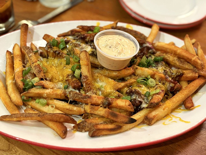 Disco Fries that would make John Travolta dance&mdash;crispy potatoes smothered in cheese, gravy, and green onions. Saturday Night Fever on a plate.