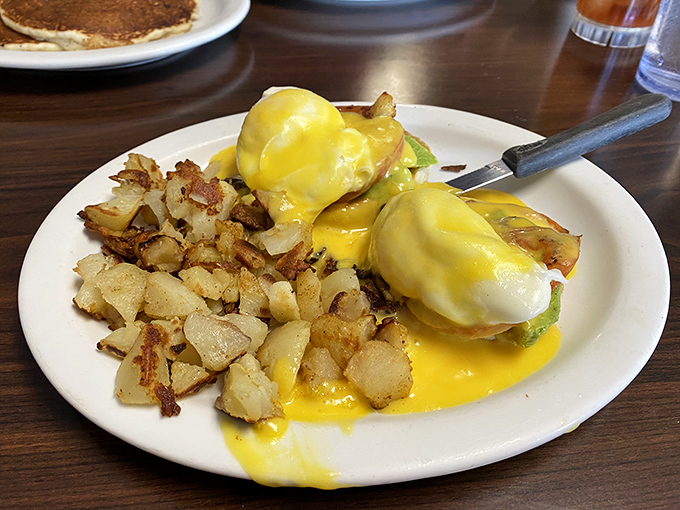 Eggs Benedict that would make a brunch snob weep with joy&mdash;perfectly poached eggs draped in hollandaise that practically glows.