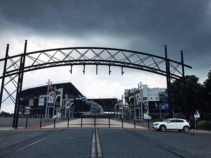 The gateway to motorsport excitement frames Miles in the distance, a stone sentinel guarding Delaware's temple of speed.