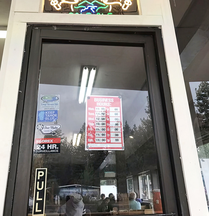 Business hours posted on the door&mdash;or as I call it, "the schedule of happiness" for anyone visiting South Lake Tahoe.