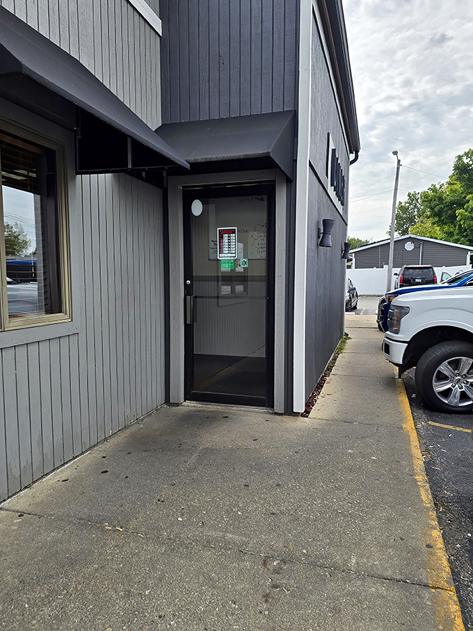 The side entrance&mdash;where regulars slip in for their usual without fanfare. That door has welcomed more hungry souls than most therapists.