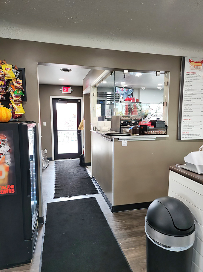 The path to hot dog nirvana is clearly marked. This hallway leads to where the magic happens&mdash;a kitchen that understands the profound importance of proper condiment distribution.