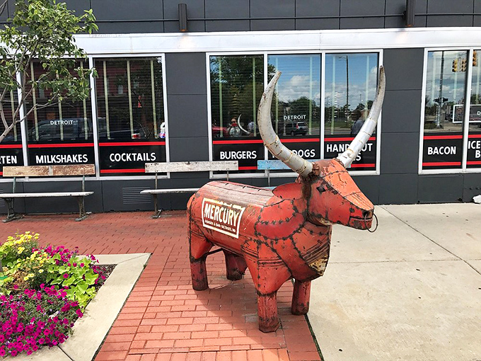 This isn't just metal yard art&mdash;it's Mercury's unofficial mascot, greeting hungry visitors with a quirky charm that says "Detroit" in the best possible way.