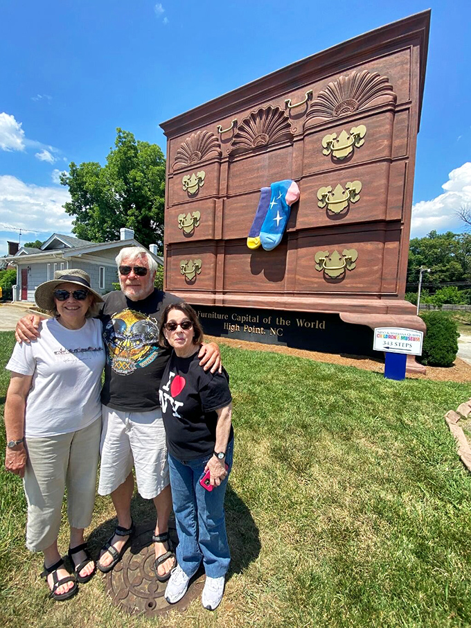 Three generations gather to document their pilgrimage to furniture fame&mdash;this is how family memories get stored away for safekeeping.