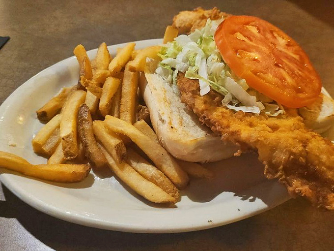 The fish sandwich that makes landlocked Hoosiers forget they're 700 miles from the ocean. Crispy, flaky, and paired with fries that deserve their own fan club.