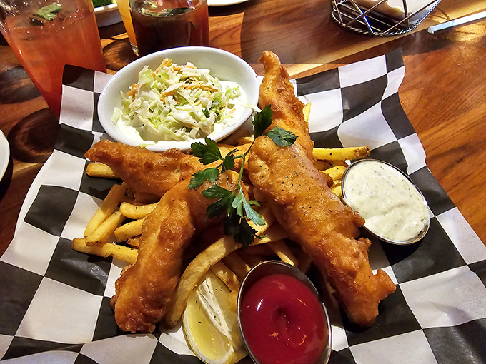 Fish and chips that would make a British pub nervous&mdash;golden, crispy, and served with enough dipping options to keep you busy until dessert arrives.