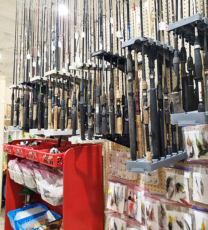 An angler's paradise where fishing rods hang like stalactites, promising adventures on Missouri lakes that haven't yet happened.