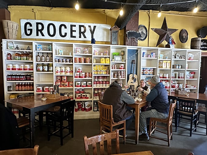 The "GROCERY" sign remains, but these shelves stock something better than ingredients &ndash; they hold the finished masterpieces.