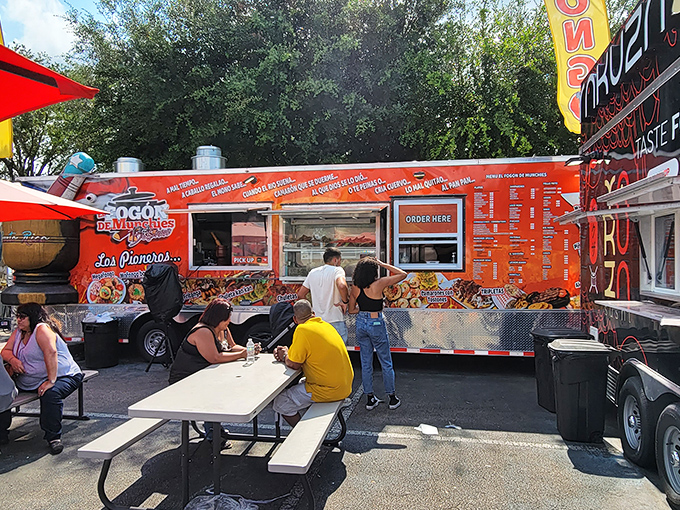 Food truck heaven where hungry shoppers refuel on authentic Latin flavors before diving back into the bargain hunting fray.