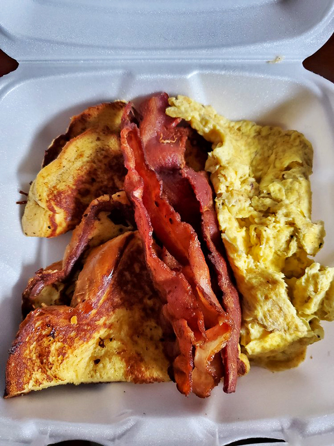 French toast and bacon in a takeout container &ndash; proof that happiness can indeed be purchased for less than $10.