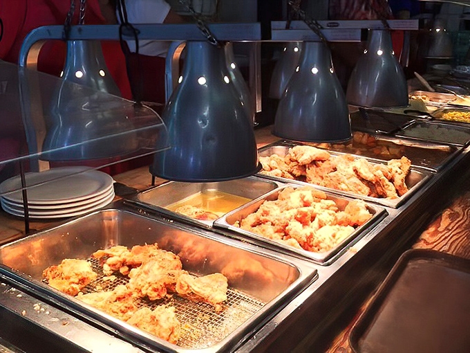 Fried chicken under heat lamps &ndash; not just food, but edible sunshine that makes you understand why people cross county lines for lunch.