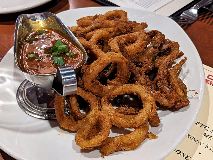 Calamari that defies the rubbery reputation of lesser versions&mdash;crisp, tender, and begging to be dunked in that savory sauce.