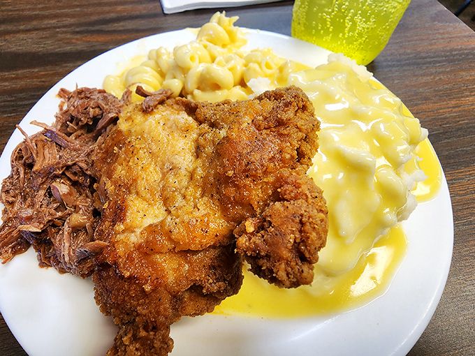 Southern comfort meets Ohio hospitality: crispy fried chicken, pulled pork, and mac & cheese that could make a cardiologist nervously reconsider their career choice.