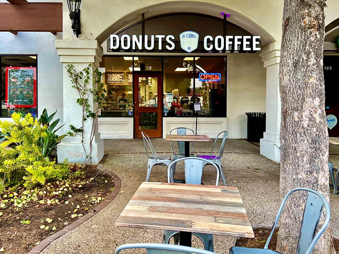 Outdoor seating that beckons on a California morning. Where better to contemplate life's mysteries than under dappled sunlight with a donut in hand?