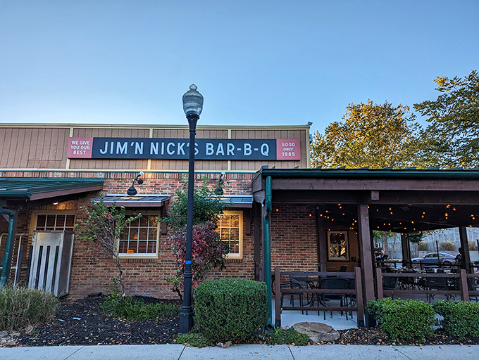 Daylight reveals the humble exterior of a place that doesn't need fancy architecture—the smoke signals rising from within tell you everything you need to know.