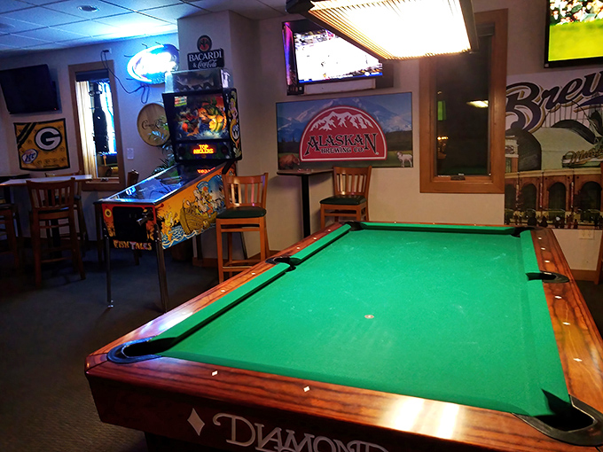 Between bites, challenge friends to a game of pool. In Wisconsin, friendly competition is just another form of socializing.