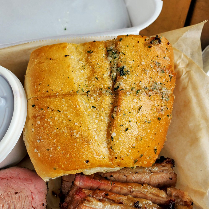 Garlic bread that doesn't whisper but announces its presence with authority—the perfect vehicle for sopping up every last drop of sauce.