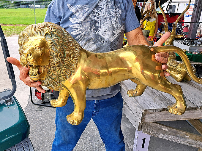 "I'm ready for my close-up!" This golden lion statue demands attention and would make a statement entrance piece for the right home.