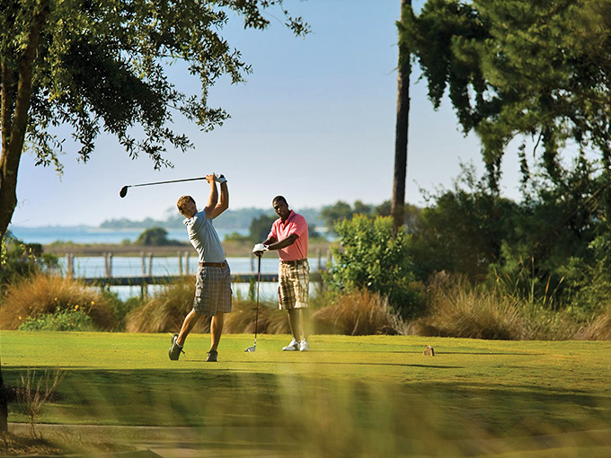Golf with a water view&mdash;because missing a putt feels less painful when dolphins might be watching.