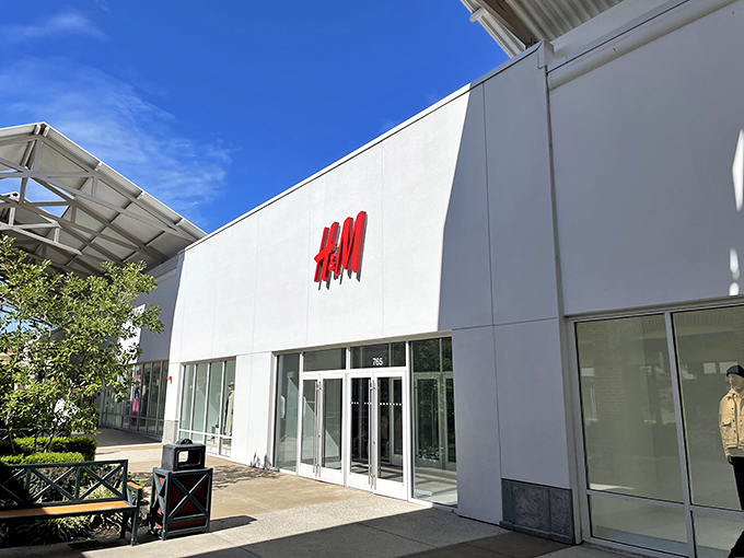 H&M's minimalist white facade houses maximum fashion potential. Swedish design meets American bargain hunting in this fast-fashion paradise.