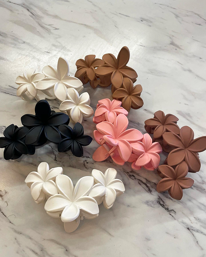 Colorful hair accessories prove that sometimes the smallest details make the biggest fashion impact statements.