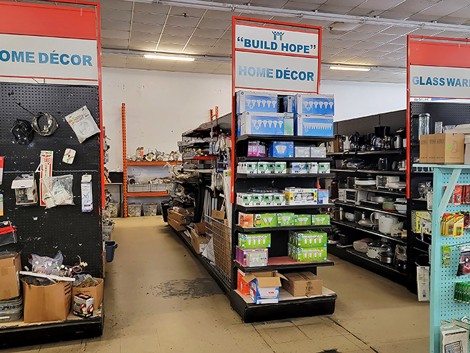 The home d&eacute;cor aisle&mdash;where the sign literally tells you to "BUILD HOPE." Fill your shelves and fuel community dreams simultaneously.