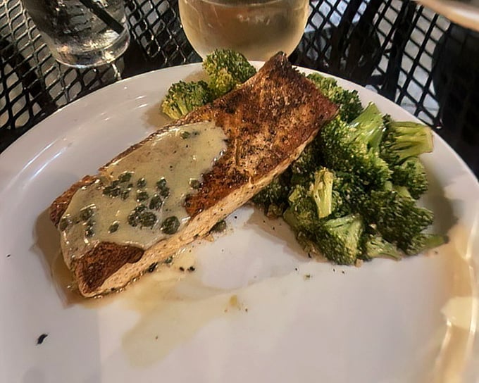 The honey dijon salmon proves Boston Commons isn't just about fried indulgences—this perfectly seared fish with bright broccoli showcases their culinary range.