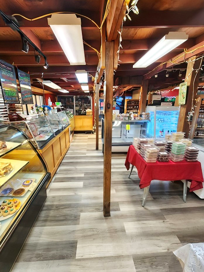 Wooden beams and display cases create a rustic charm that whispers, "Stay awhile and try everything &ndash; diet starts tomorrow."