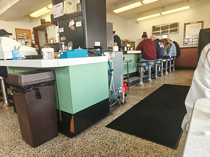 A diner where the conversation flows as freely as the coffee, and everyone feels like they've been coming here their whole lives.