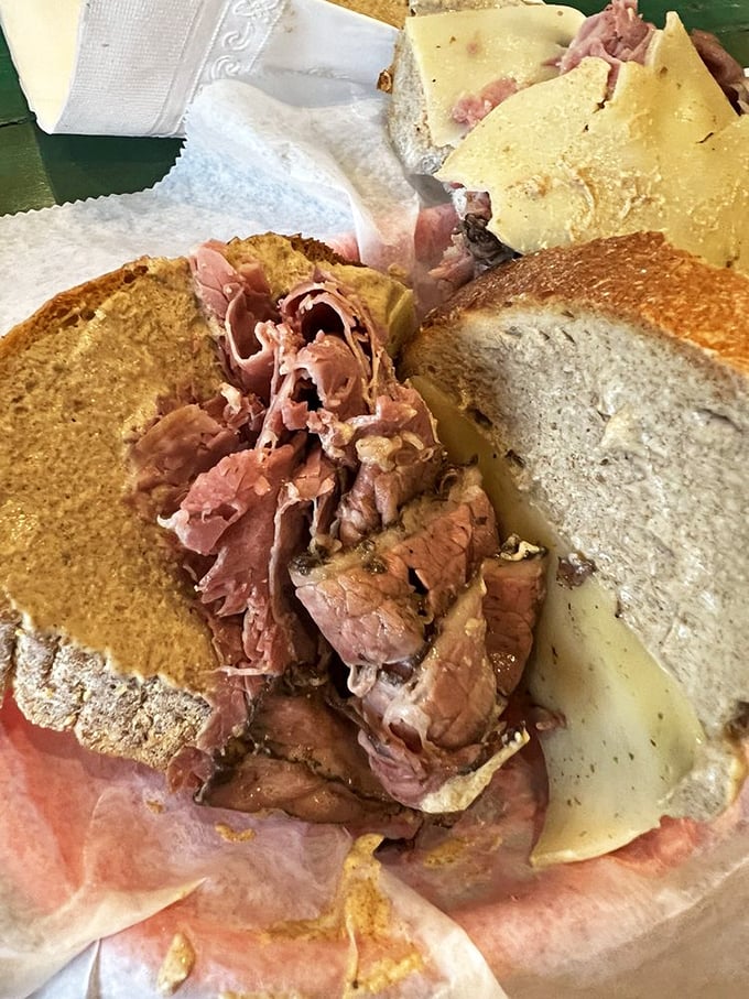 A sandwich so tall it needs its own zip code. Layer upon layer of deliciousness that requires both hands and possibly a fork.