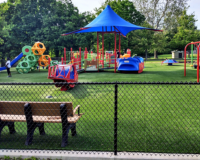 This vibrant playground proves Bellefontaine caters to visitors of all ages. Monkey bars: still providing childhood joy since forever.