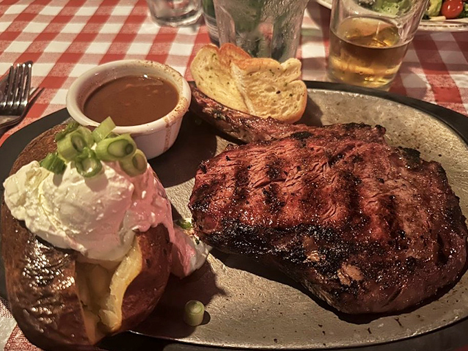 A perfectly charred ribeye with a loaded baked potato. The steakhouse equivalent of a greatest hits album&mdash;every track a winner.