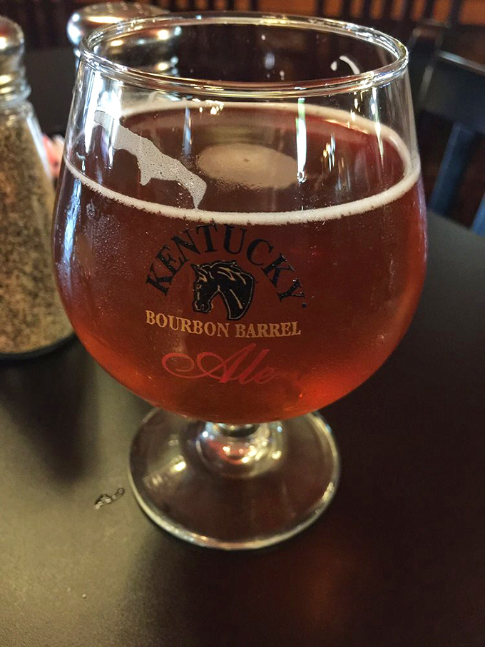 A Kentucky Bourbon Barrel Ale catching the light just right&mdash;liquid amber that tastes like oak-aged happiness.