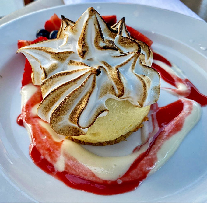 Key lime pie wearing a toasted meringue hat and berry coulis cape. Dessert that dresses better than most people at the yacht club.
