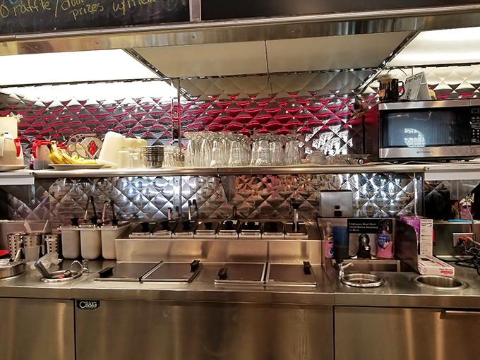 The gleaming stainless steel kitchen&mdash;where breakfast magic happens all day long behind a choreographed dance of spatulas and sizzle.