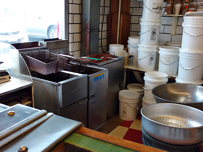 Behind the scenes where the nut-roasting alchemy happens. Those white buckets hold secrets that corporate America would pay millions for.