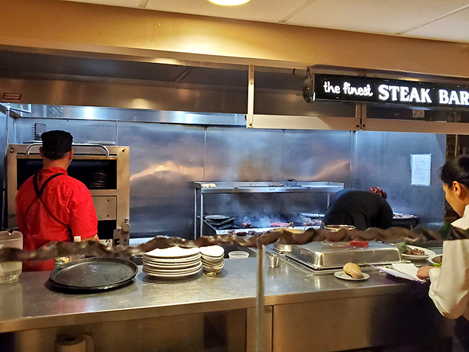 The kitchen pass—that magical portal where raw ingredients transform into the dishes that have kept locals coming back since Eisenhower was president.