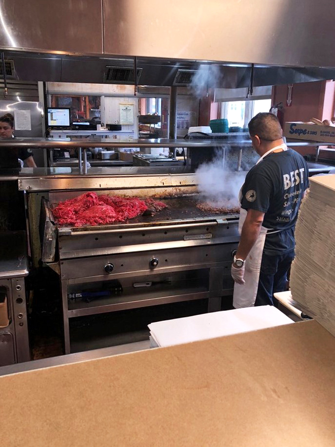 Where the magic happens&mdash;a glimpse into the kitchen reveals the choreographed dance of sandwich creation in full swing.