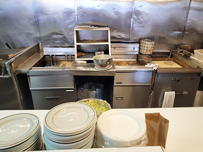 No fancy kitchen gadgets or molecular gastronomy here—just well-seasoned equipment that knows exactly how to treat fish right.