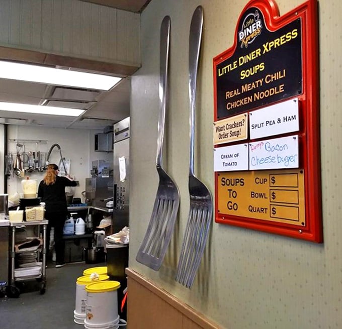 Giant decorative forks flank a soup menu &ndash; a playful reminder that serious eating happens here, and they've got the oversized utensils to prove it.