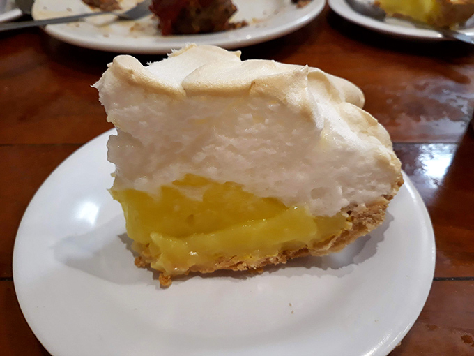 Lemon meringue pie with a mile-high top that's part dessert, part work of art, and entirely worth the sticky fingers you'll happily lick clean.