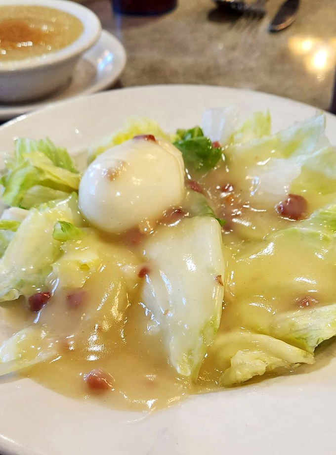 A salad that's clearly just visiting the diner menu &ndash; light, refreshing, and wondering how it ended up surrounded by all these comfort food heavyweights.