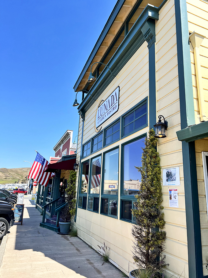 Lunada Garden Bistro's crisp white exterior and American flag offer a quintessential slice of small-town coastal dining&mdash;no reservations app required.
