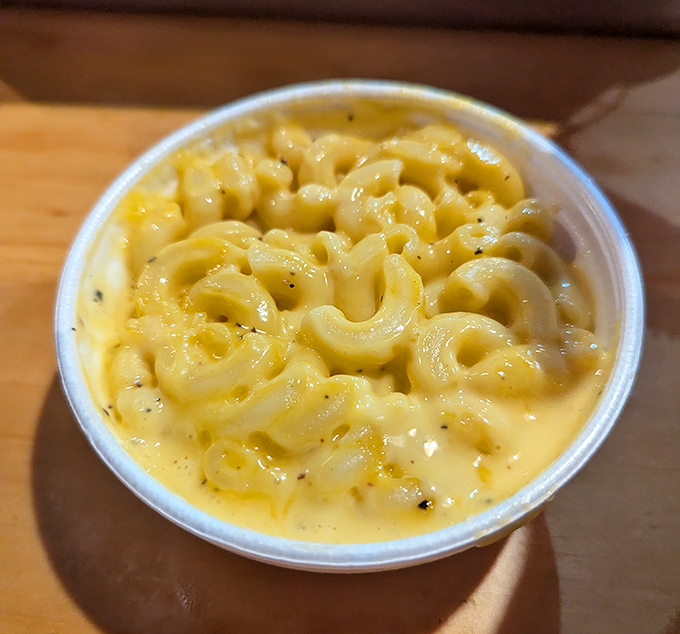 This mac and cheese isn't just a side dish&mdash;it's a creamy lifeboat in a sea of spice, offering momentary refuge between bites of fire.